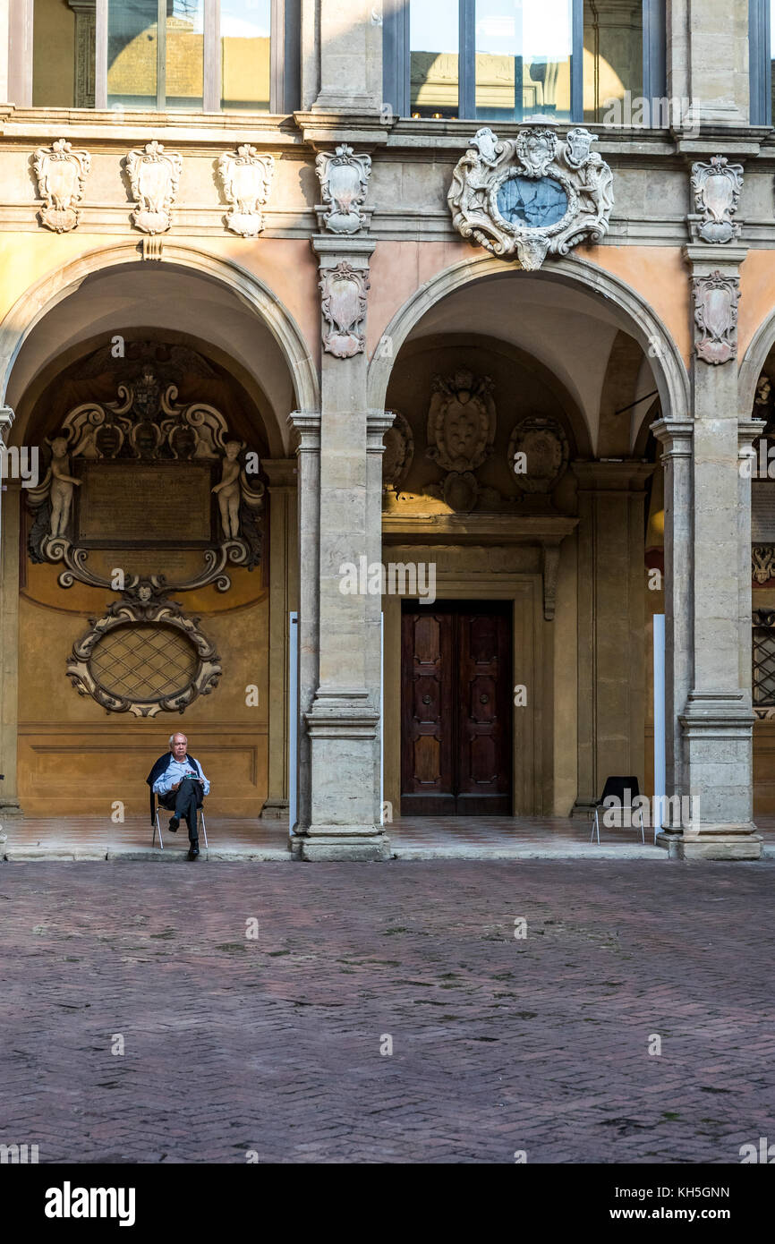 An official relaxes. The Archiginnasio of Bologna library, Bologna city ...