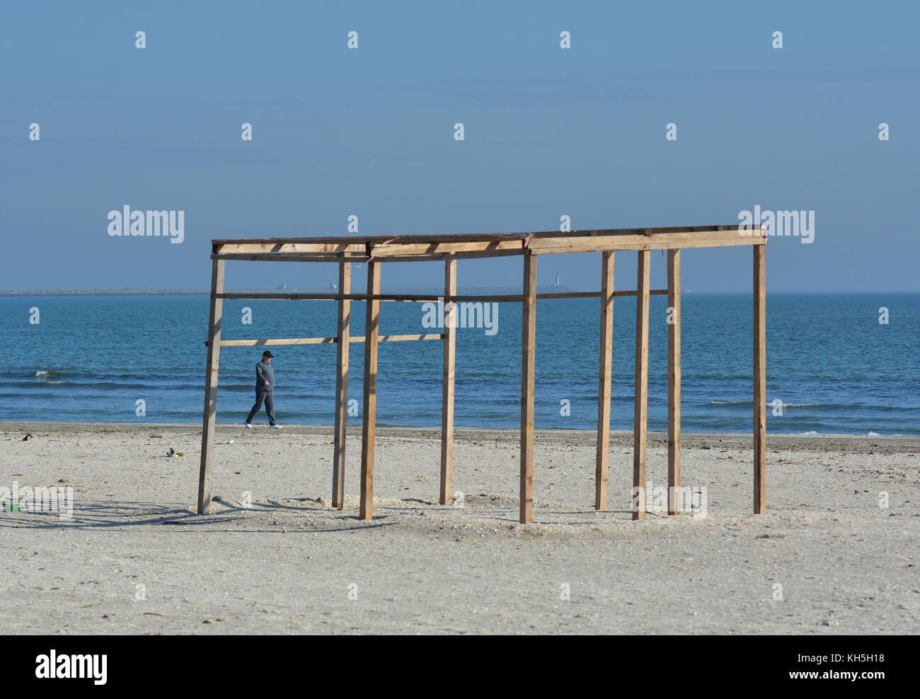Sunny autumn morning on the shore of the Black sea at Navodari beach ...