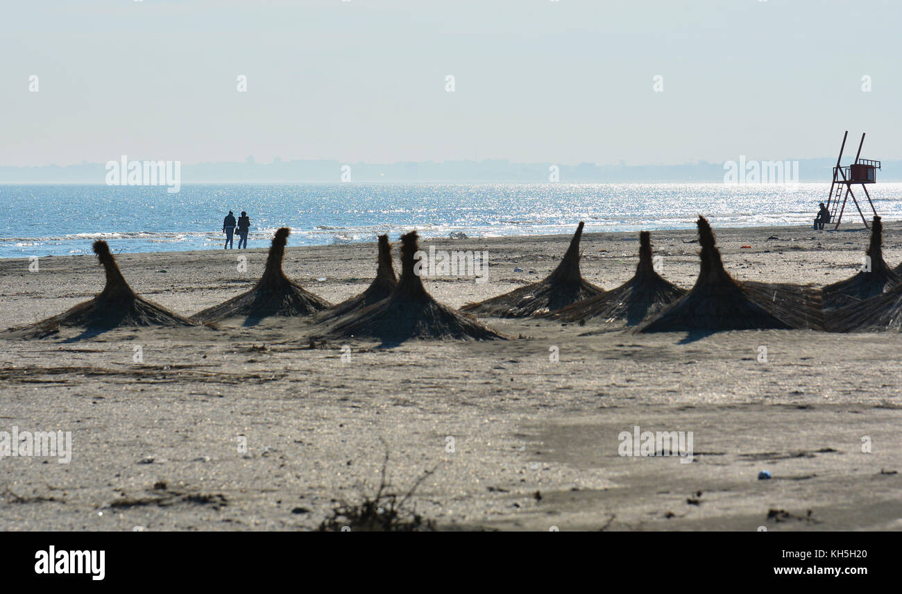 Sunny autumn morning on the shore of the Black sea at Navodari beach ...