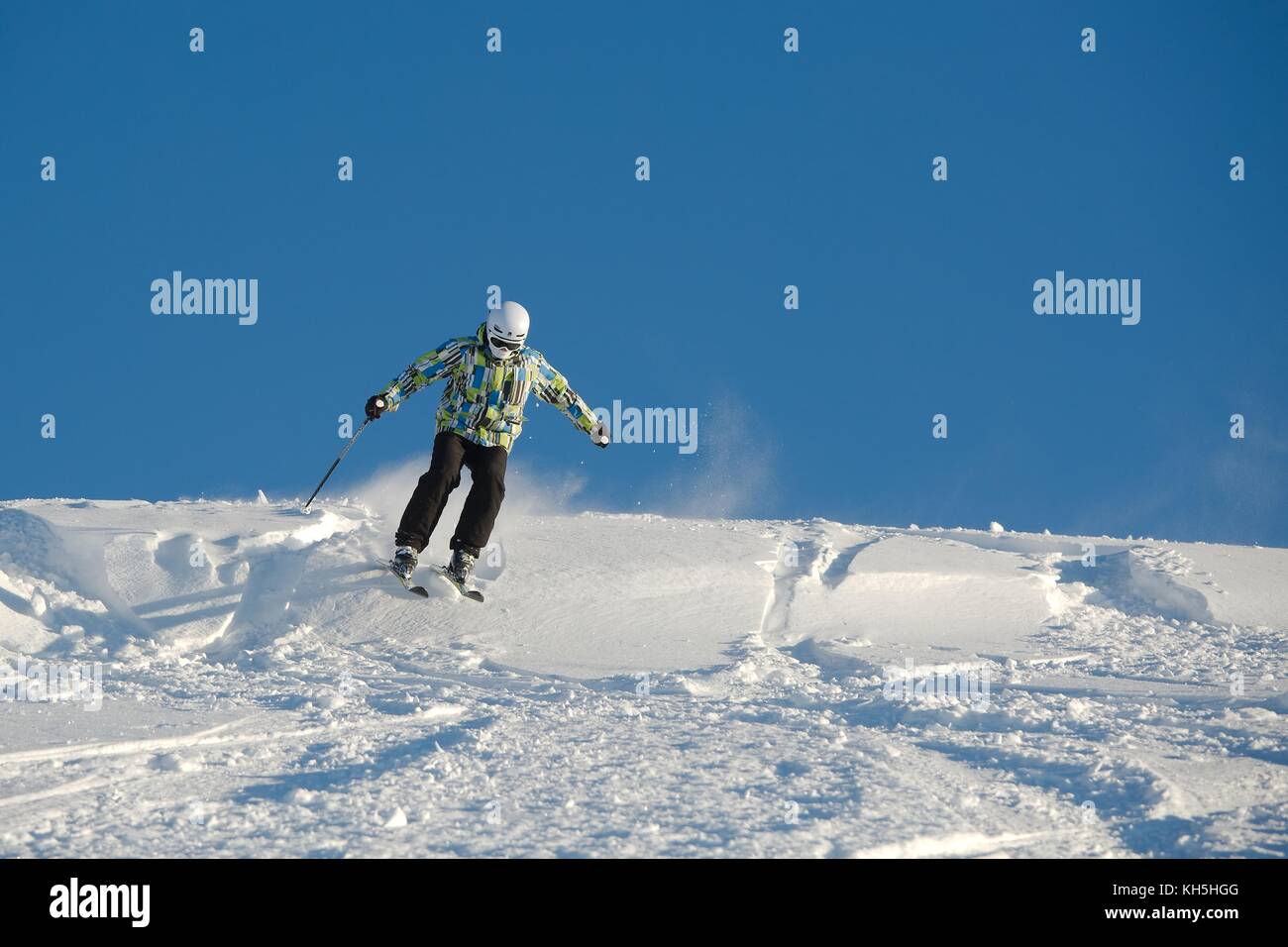 Skiing in fresh powder snow Stock Photo - Alamy