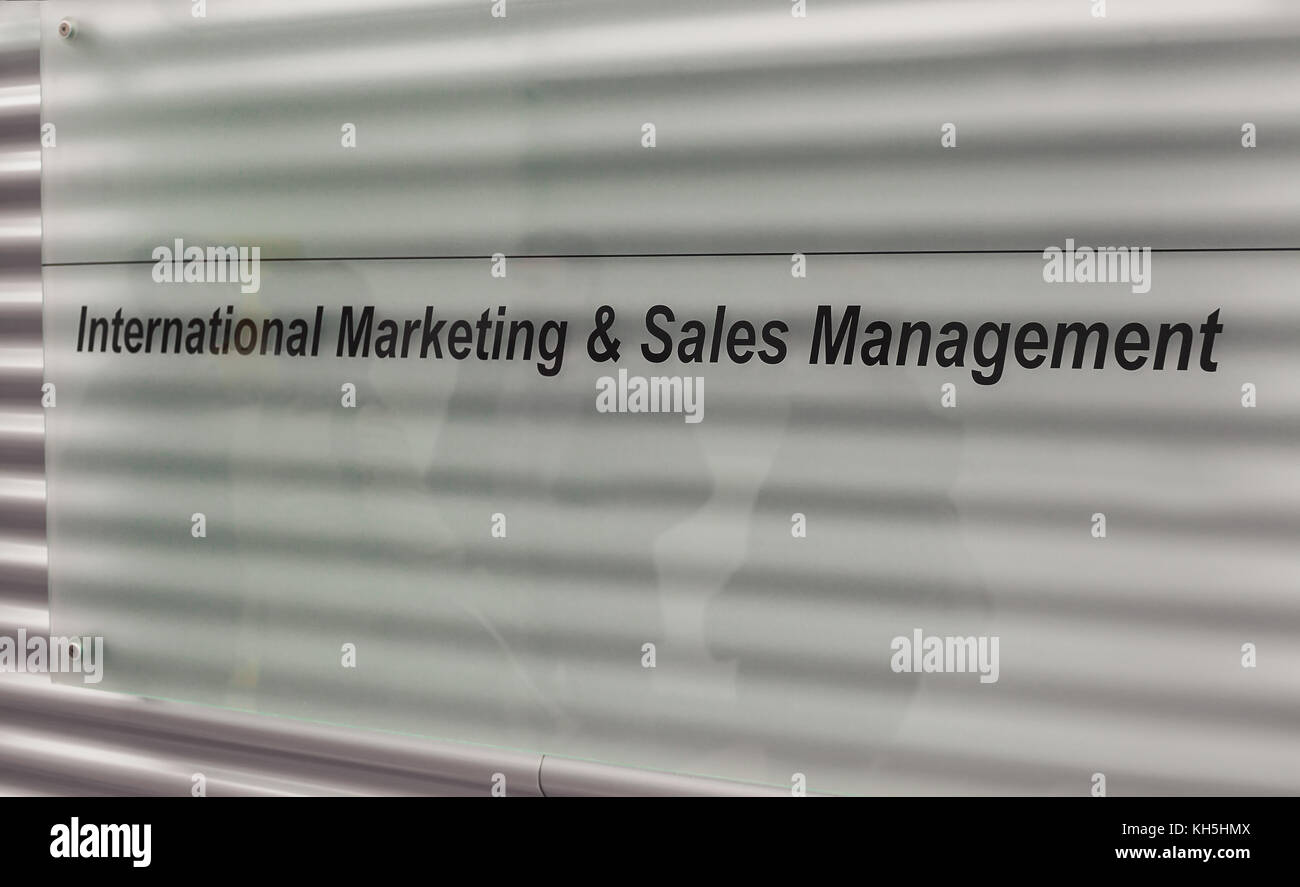 Textual commercial message printed on white glass Stock Photo - Alamy