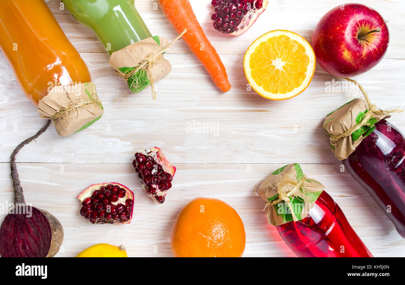 Colorful smoothies with ingredients on a table top view Stock Photo - Alamy