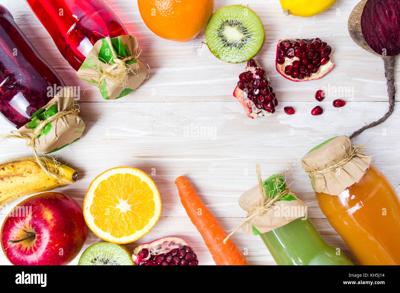 Various smoothies with ingredients on a table top view Stock Photo - Alamy