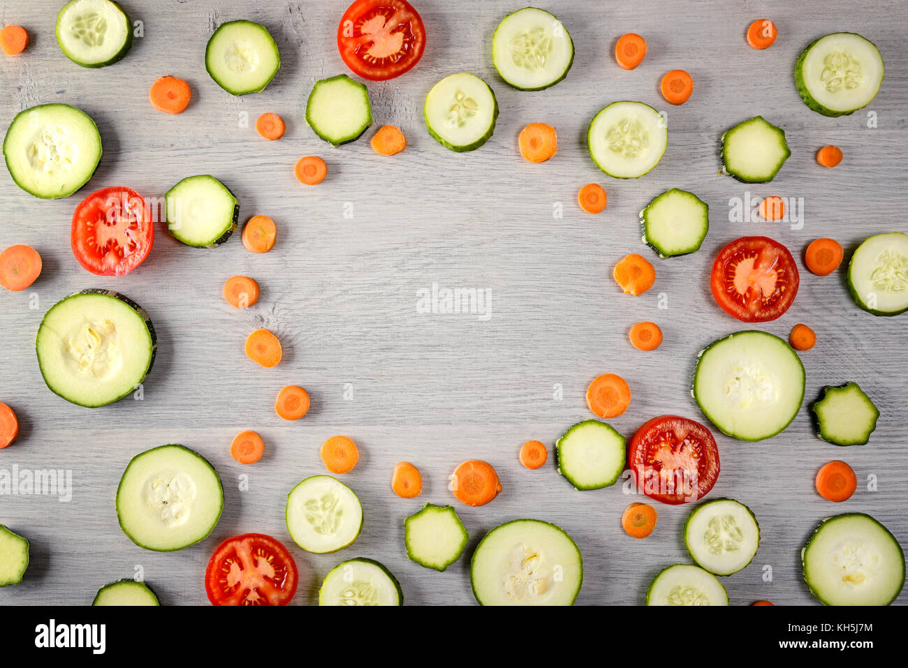 Frame natural vegetables - carrots, zucchini, tomato, cucumber. Top ...