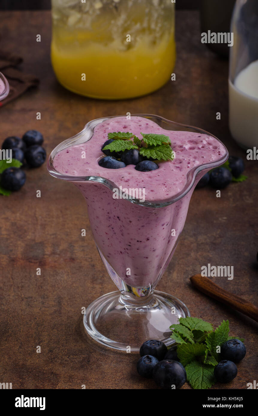Berries milkshake smoothie, delish with fresh herbs mint Stock Photo ...