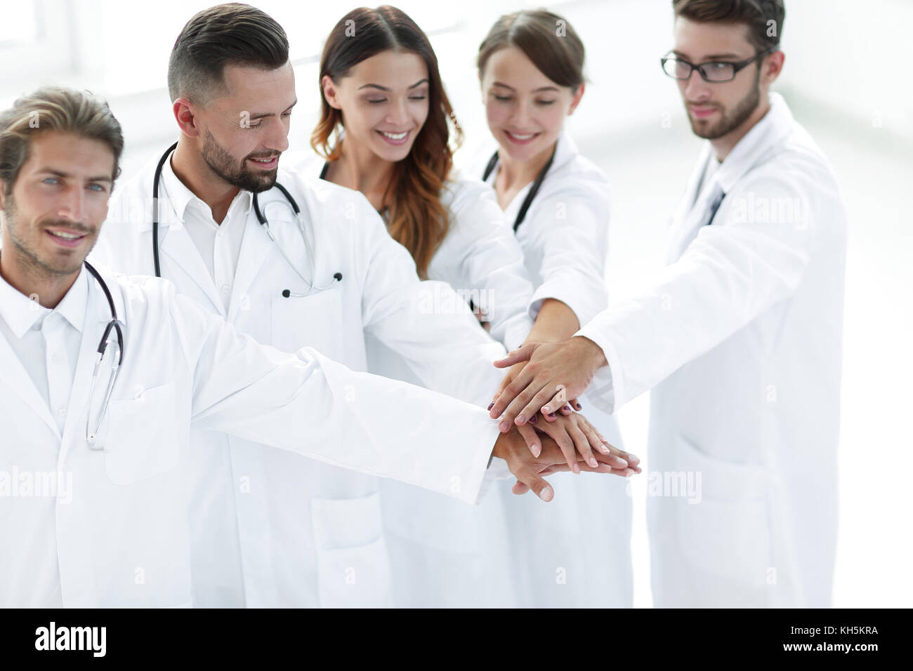 Joyful doctors are proud of their teamwork Stock Photo - Alamy