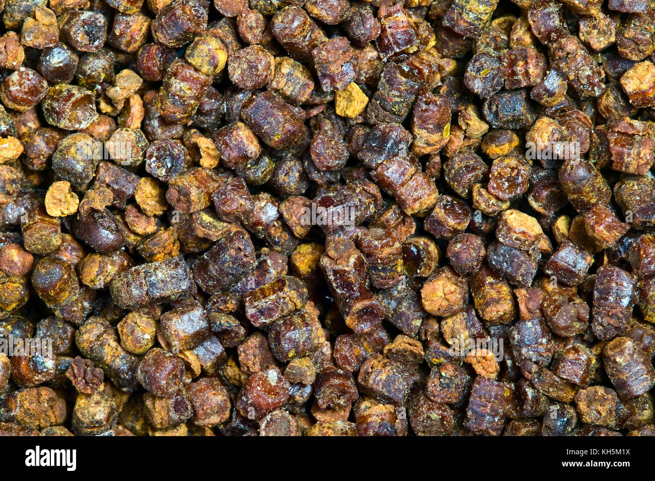 Propolis granules grunge texture background, bee product Stock Photo ...