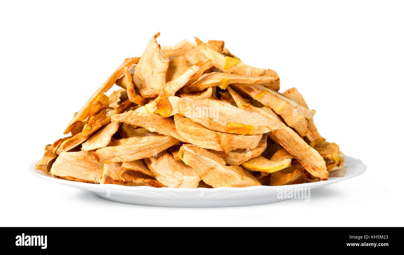 Sliced dry apples for snacks on white background Stock Photo - Alamy