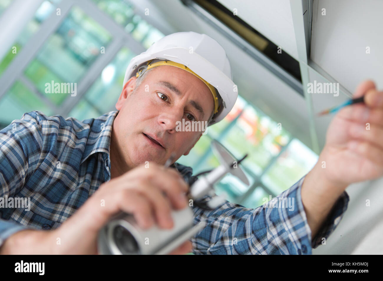 professional cctv technician working Stock Photo - Alamy