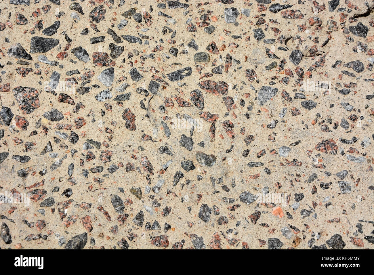 Cement with stones as a background. Closeup view Stock Photo - Alamy