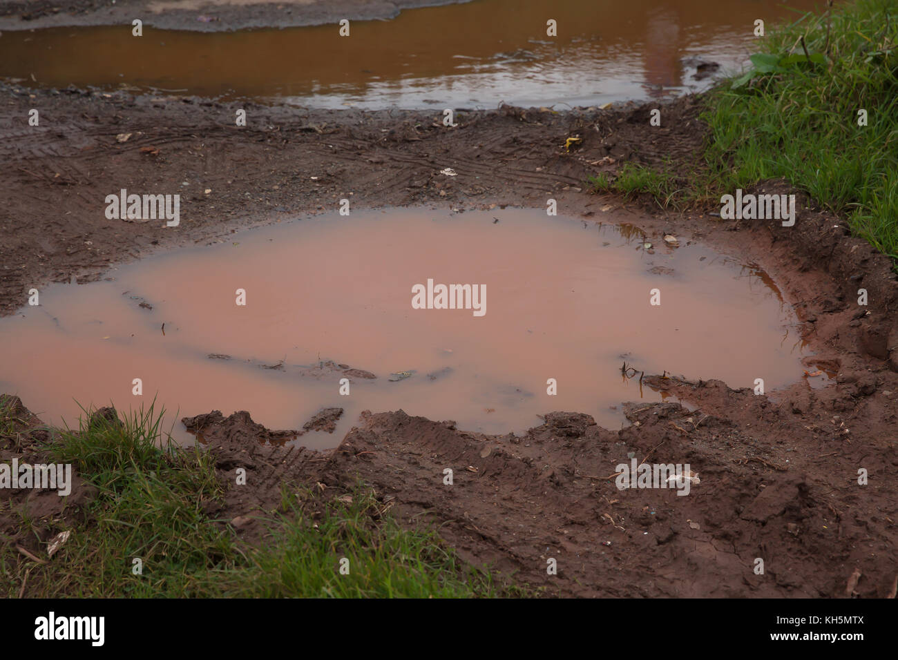 Huge Muddy puddle in Looe Cornwall Stock Photo - Alamy