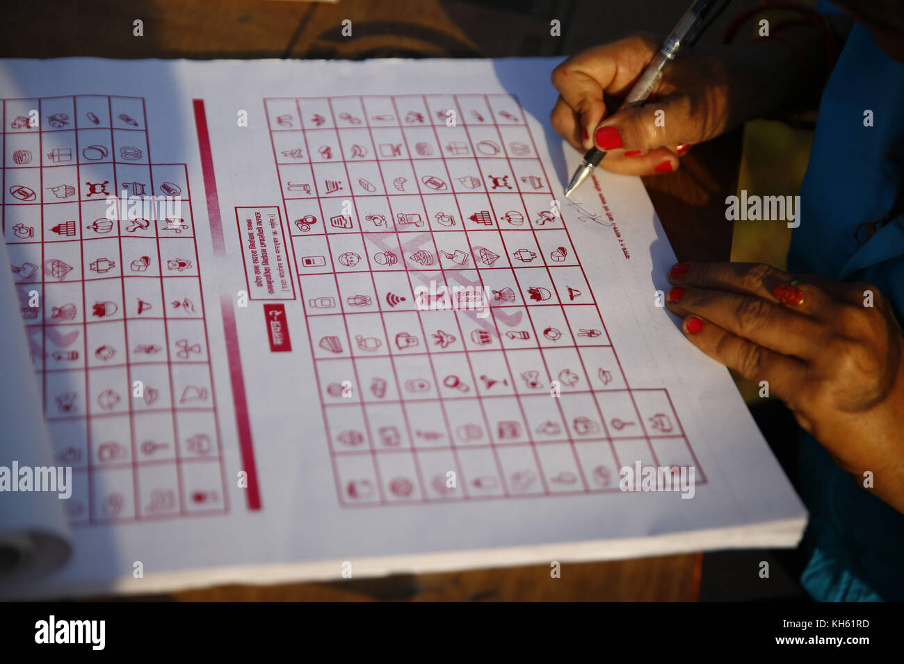 Kavrepalanchowk District, Nepal. 14th Nov, 2017. A volunteer signs a ...
