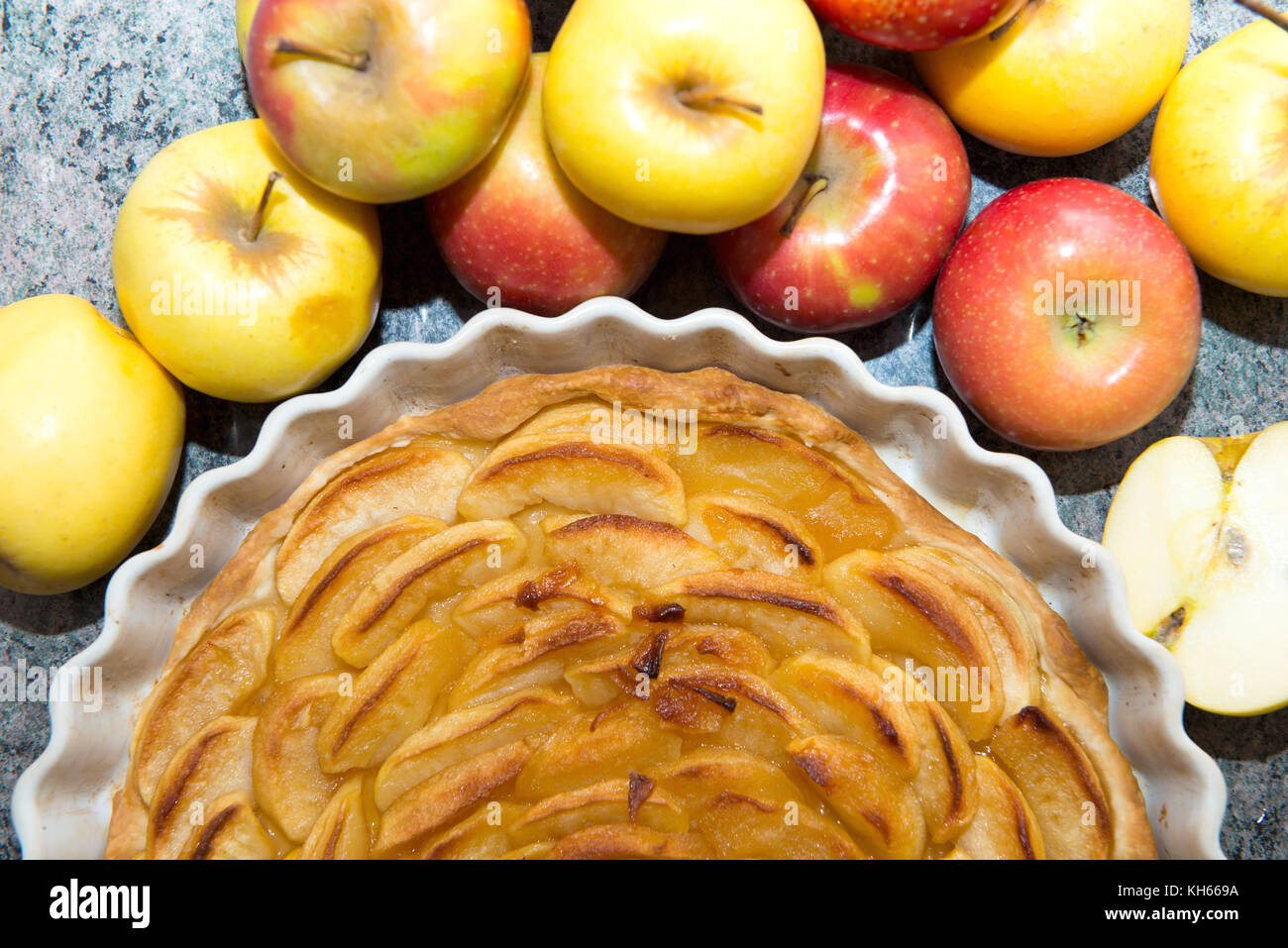 a beautiful apple pie with red and yellow apples Stock Photo - Alamy