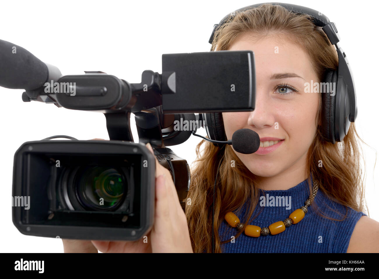 young woman with a camcorder, isolated on white background Stock Photo ...