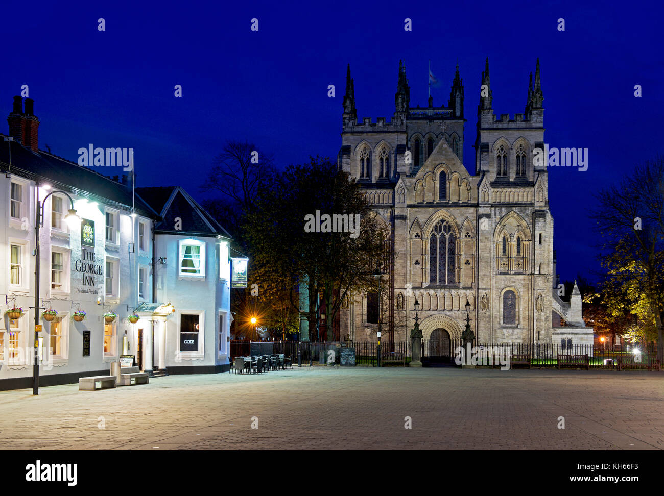 The George Inn and Selby Abbey at night, North Yorkshire, England UK ...
