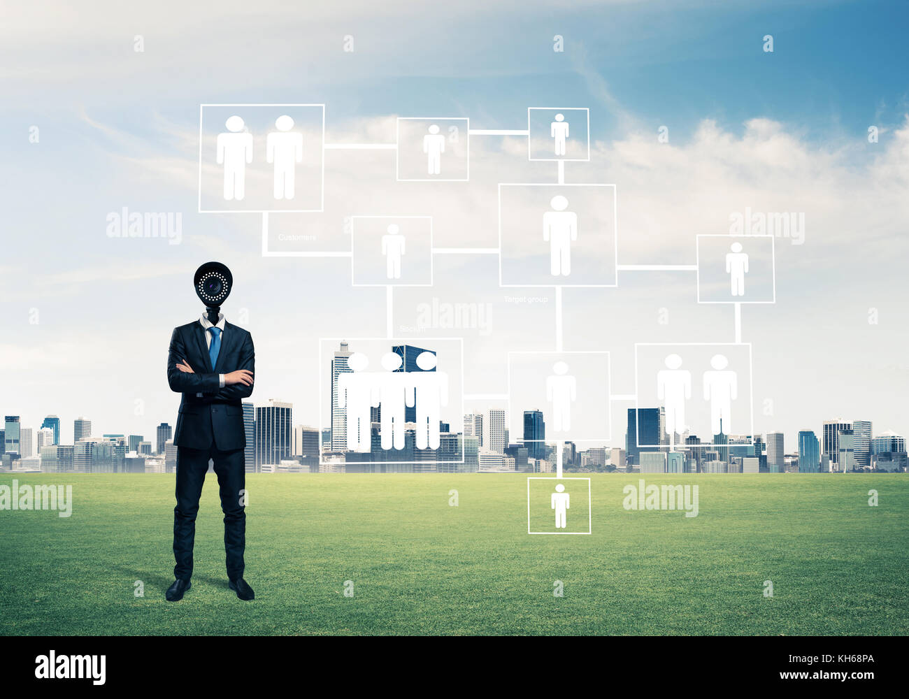 Camera headed man standing on green grass against modern citysca Stock ...