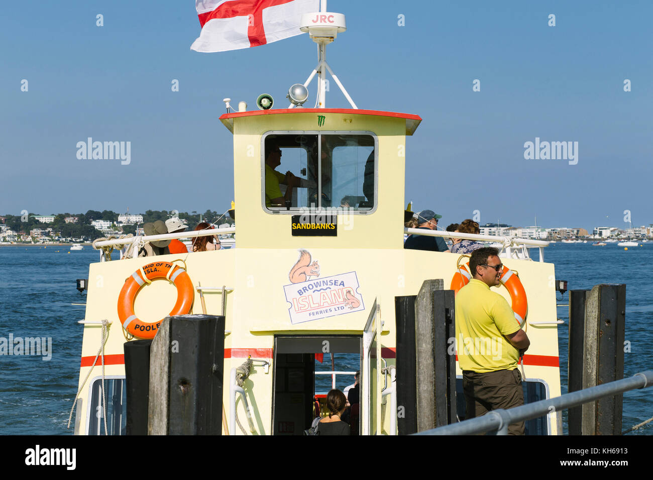 A Brownsea Island ferry docks at the island Stock Photo - Alamy