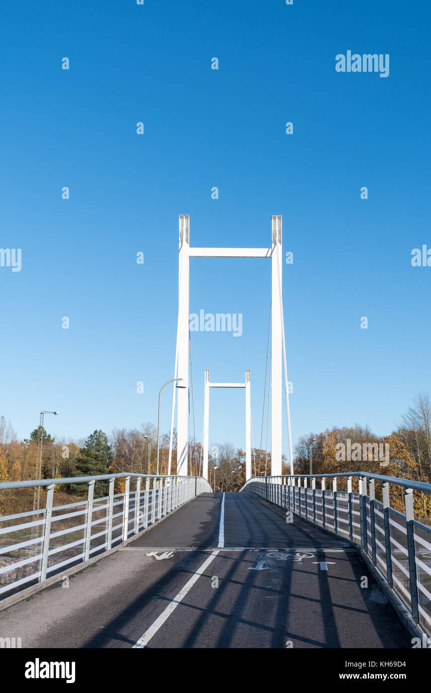 Modern hanging bridge for walking and cycling Stock Photo - Alamy