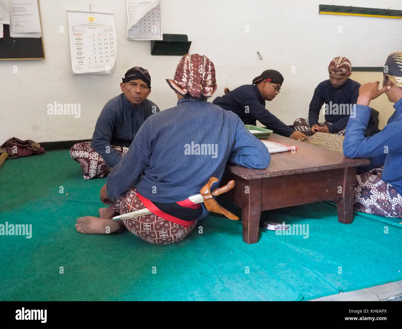 Royak guards with a kris at the back at the Kraton in Jogjakarta ...