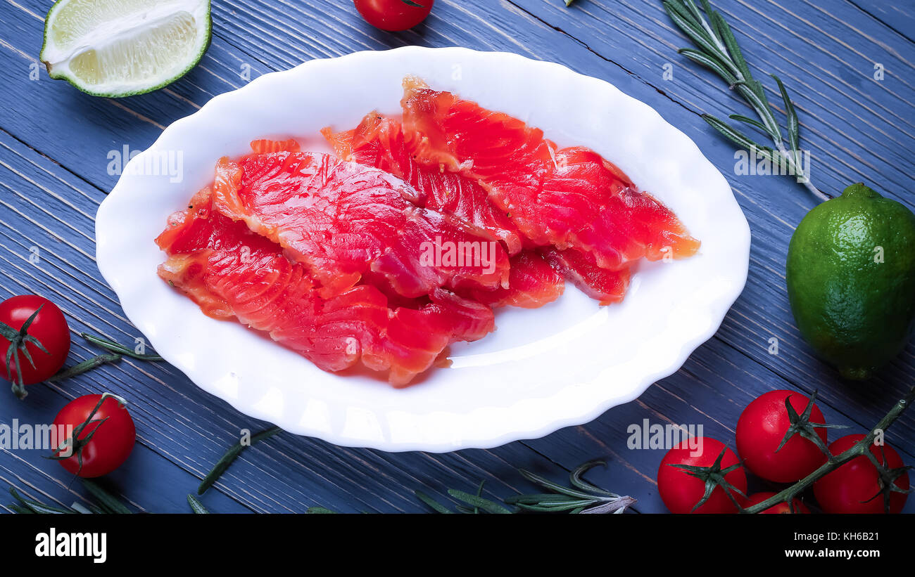 Fish sliced on the table for meals. Delicious seafood dinner. Tr Stock ...
