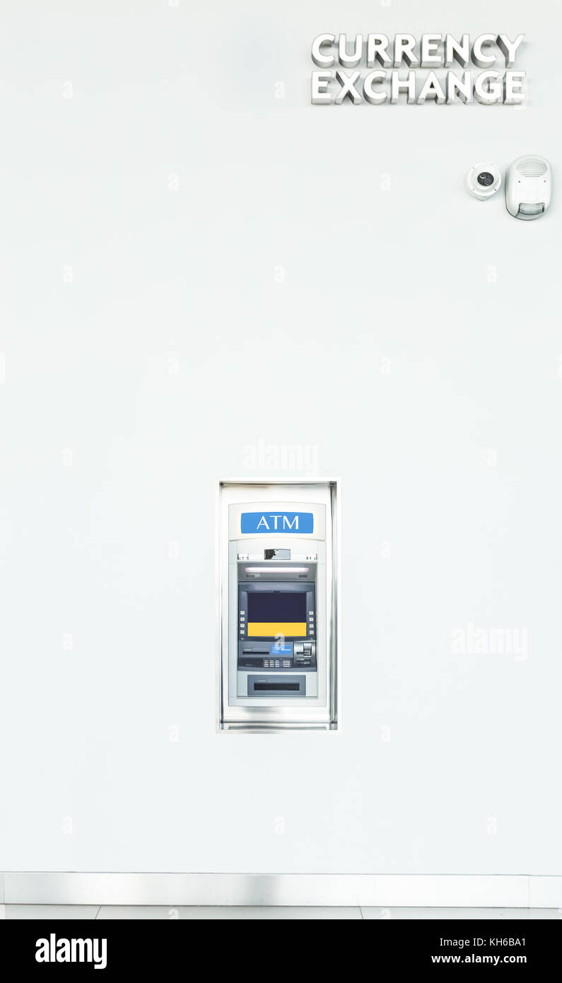 ATM machine and currency exchange with CCTV camera Stock Photo - Alamy