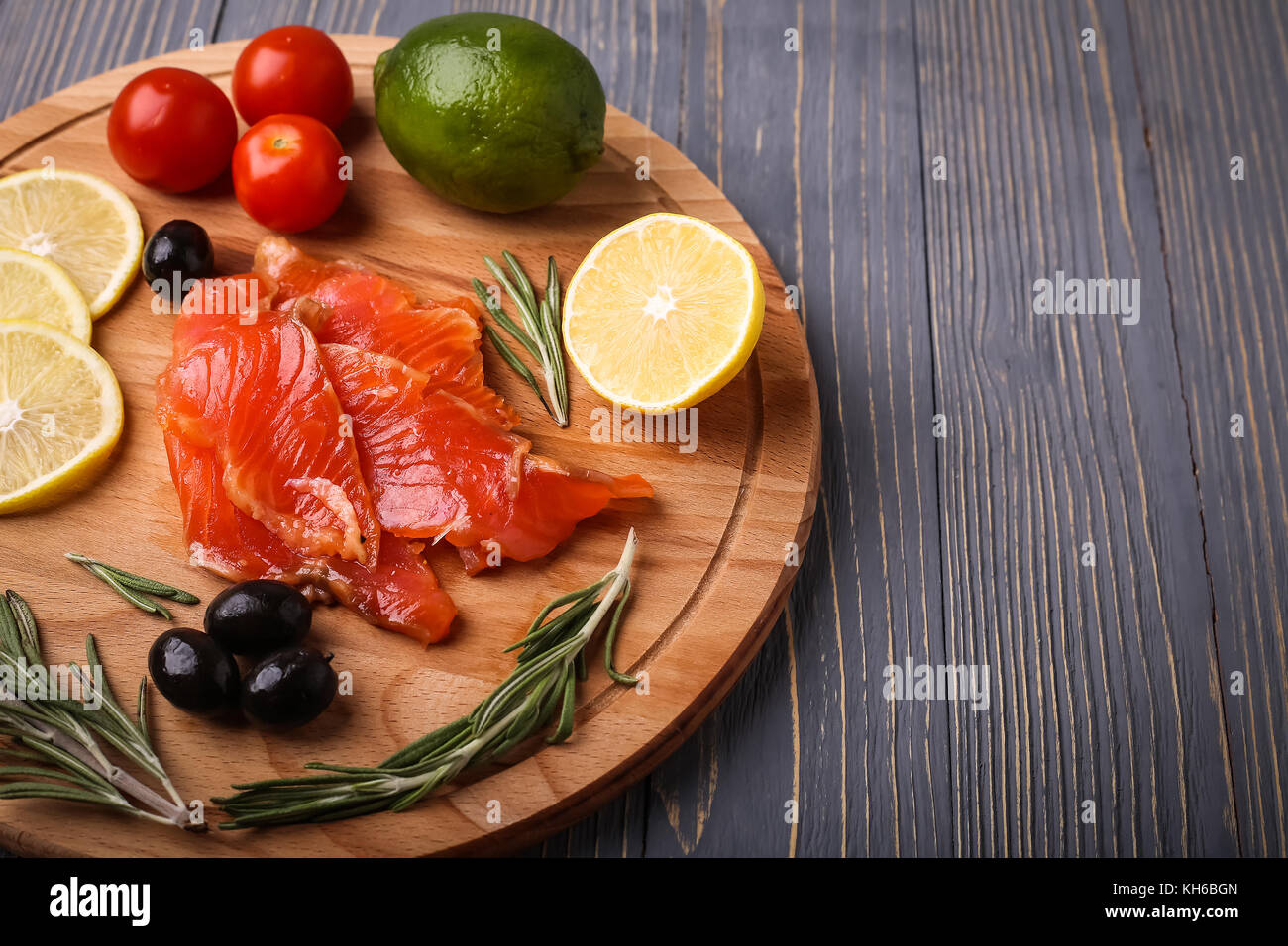 Fish sliced on the table for meals. Delicious seafood dinner. Tr Stock ...