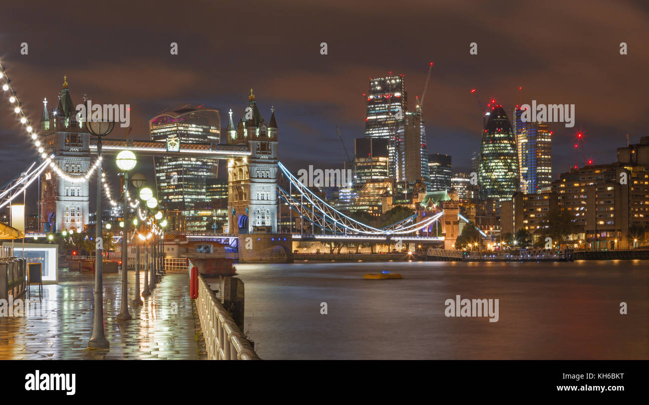 London - The Tower Bride, promenade and skyscrapers at dusk light Stock ...