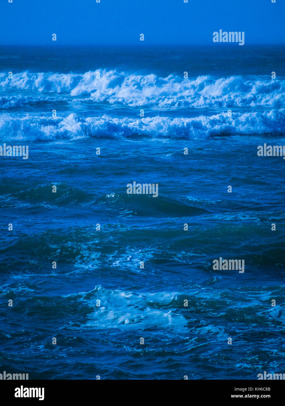 Stylised / treated image of churning sea / rough sea waves off Newquay ...