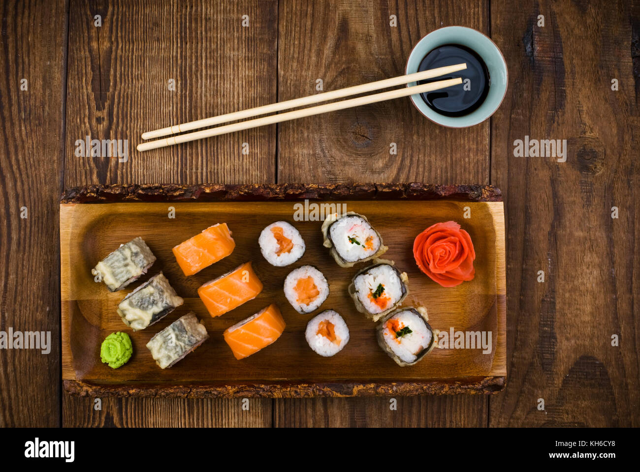 sushi on wooden table, top view Stock Photo - Alamy
