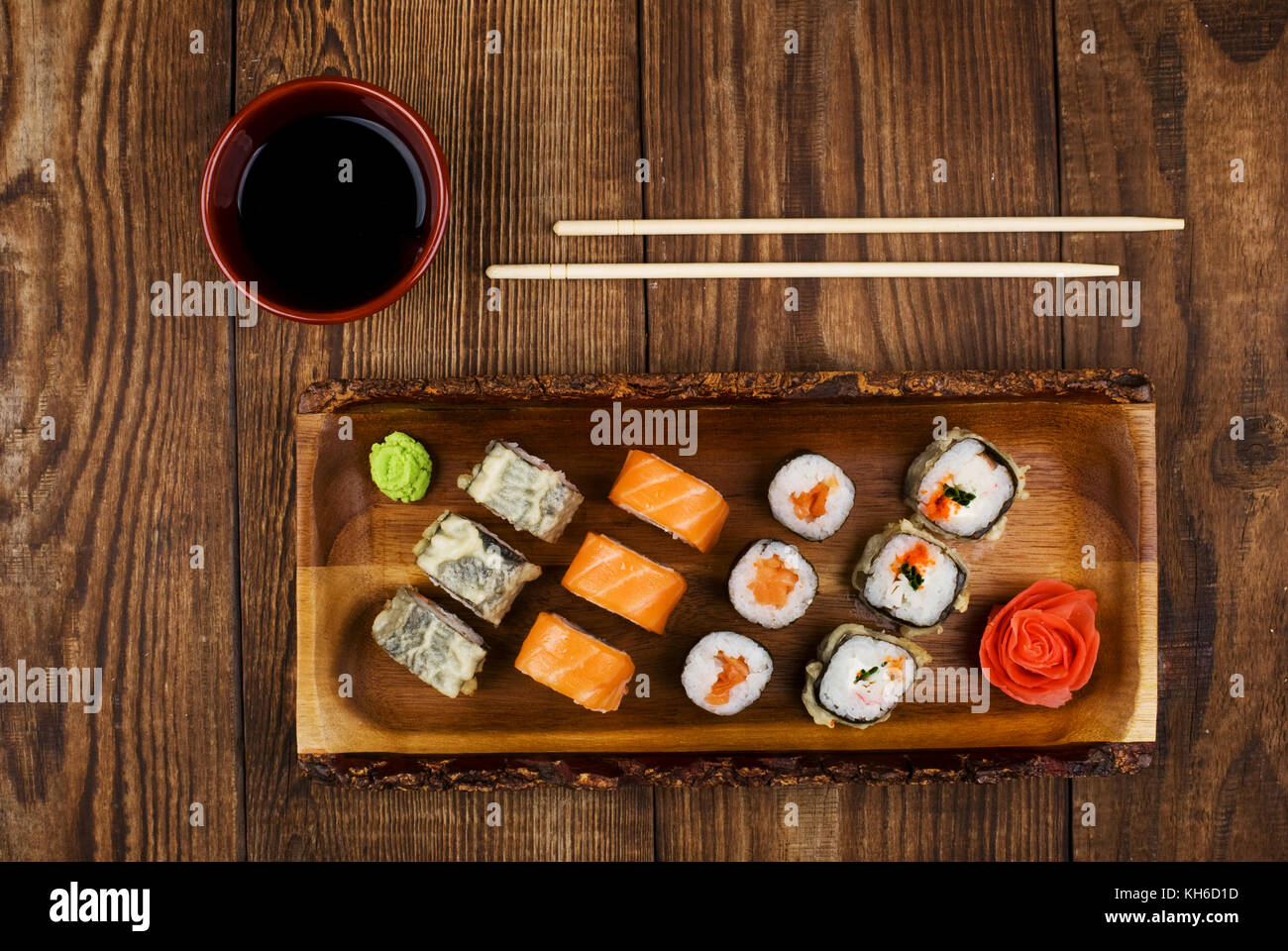 sushi on wooden table, top view Stock Photo - Alamy