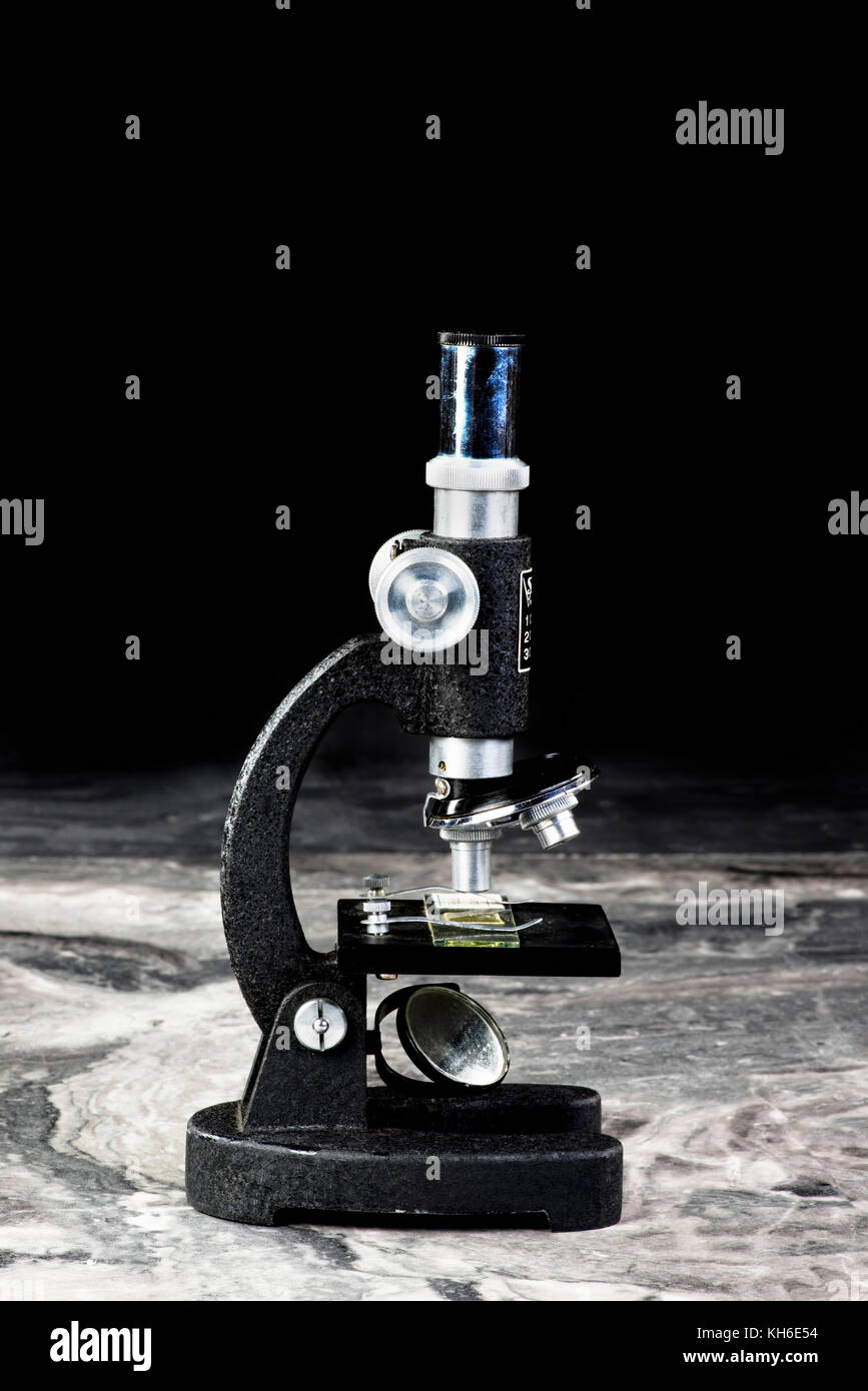 Old microscope lens hi-res stock photography and images - Alamy