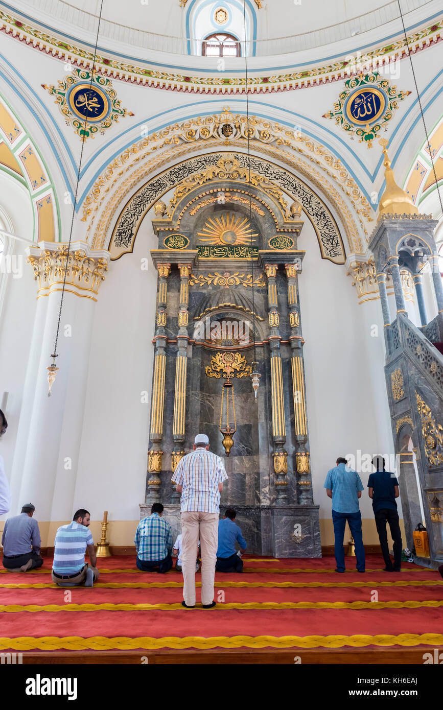 People pray at Aziziye Mosque.The mosque is a baroque and traditional ...