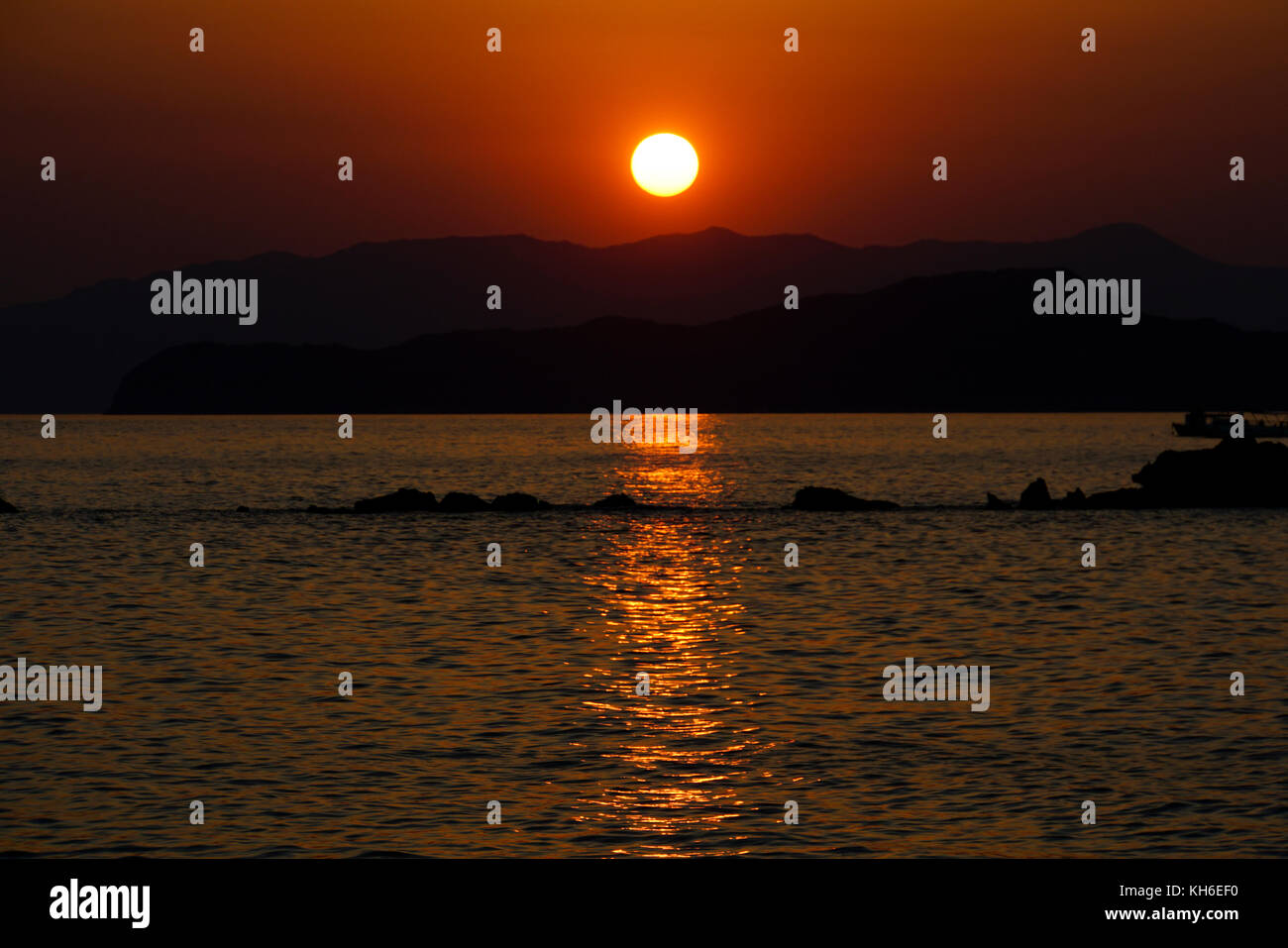 Beautiful orange and red Sunset over Crete, Greece Stock Photo - Alamy