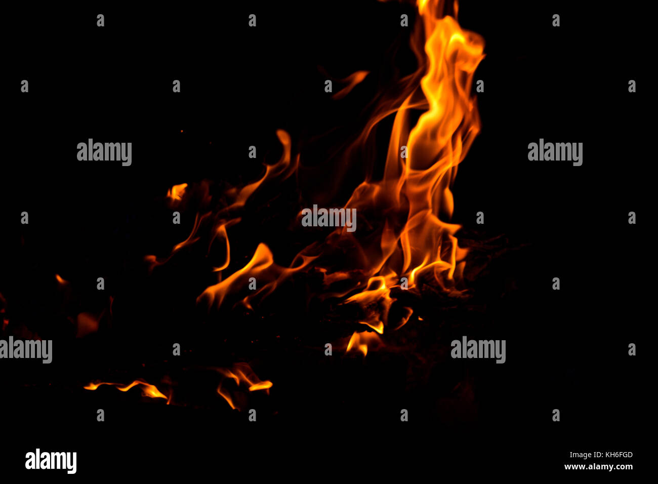 Fire flames on dark background Stock Photo - Alamy