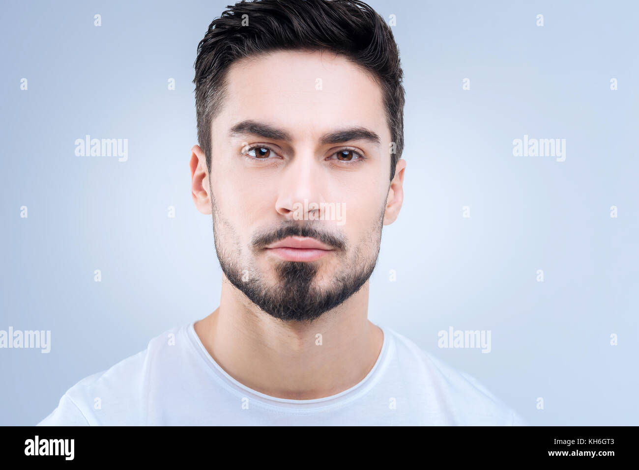 Young clever student looking calm before passing his exams Stock Photo ...