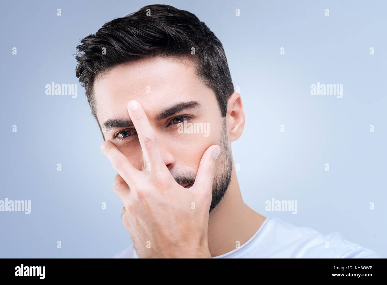 Young depressed person rejecting to show his feelings and face Stock ...