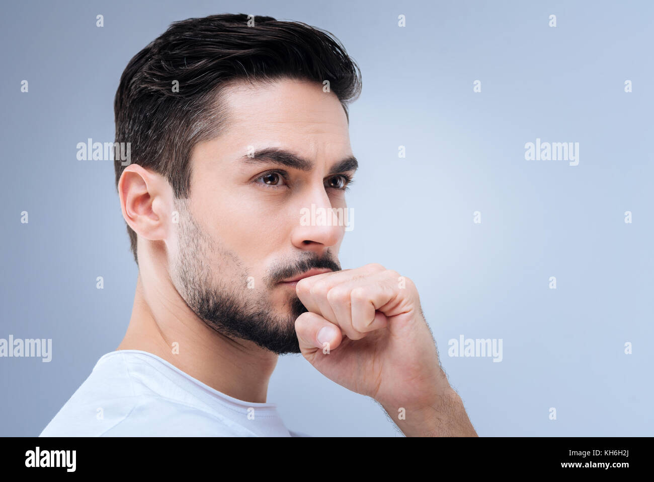 Confident smart worker looking determined and concentrated Stock Photo ...