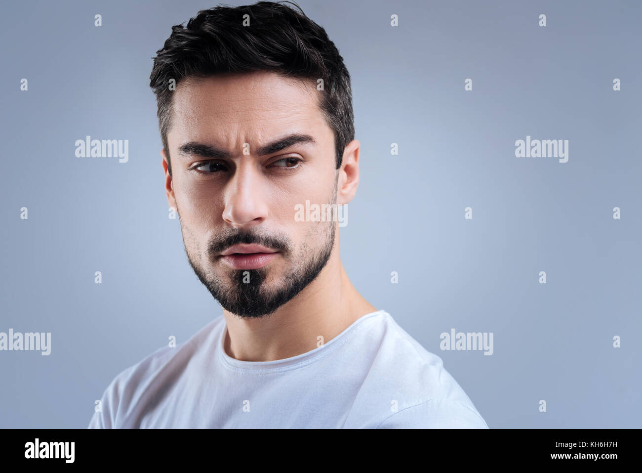 Smart calm scientist standing in his laboratory and thinking Stock ...