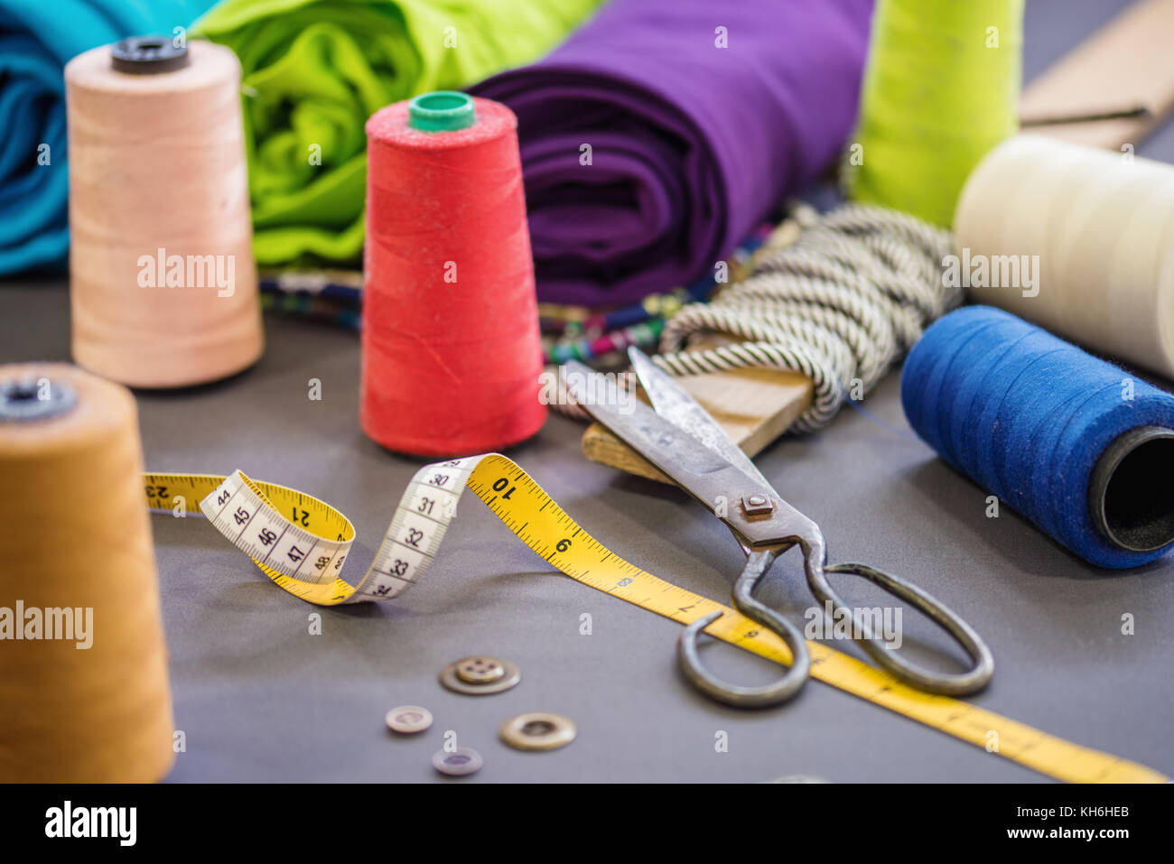 Sewing accessories on fabric background.Textile concept Stock Photo - Alamy