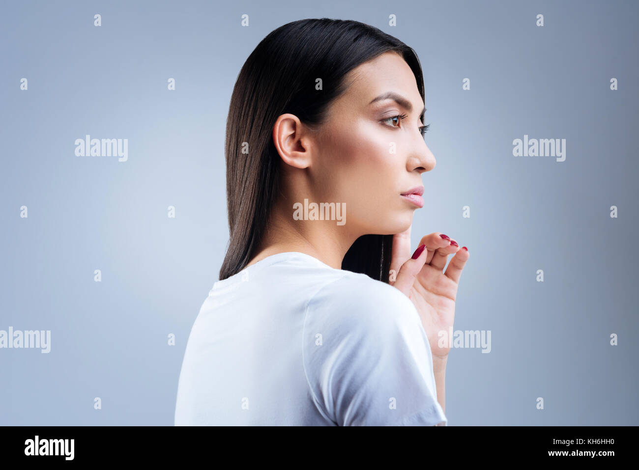 Upset young woman looking at the rain while being in a bad mood Stock ...