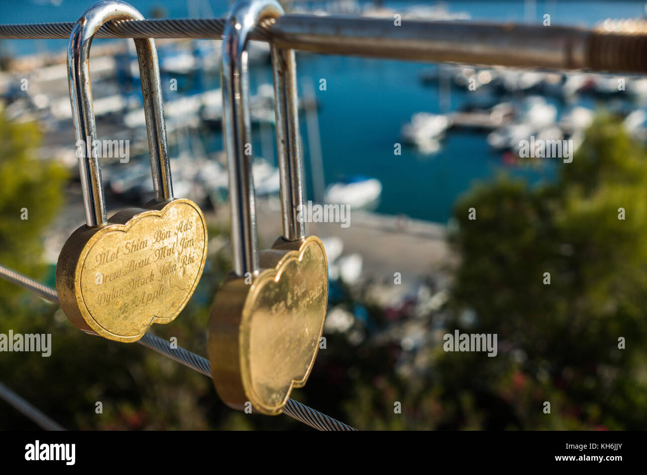 Love locks, padlocks on metal rail overlooking marina, moraira, spain ...