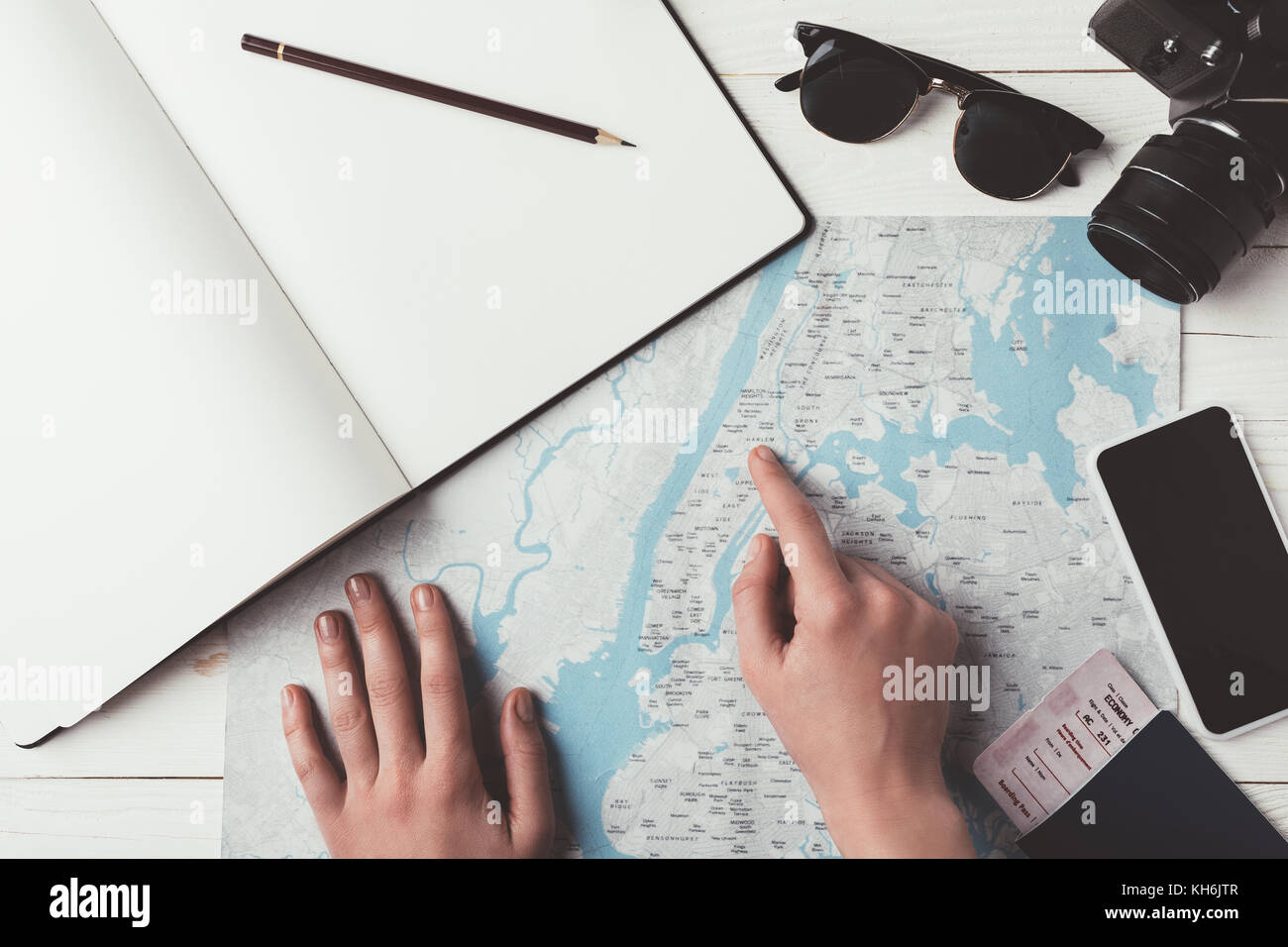 Man looking at map Stock Photo - Alamy
