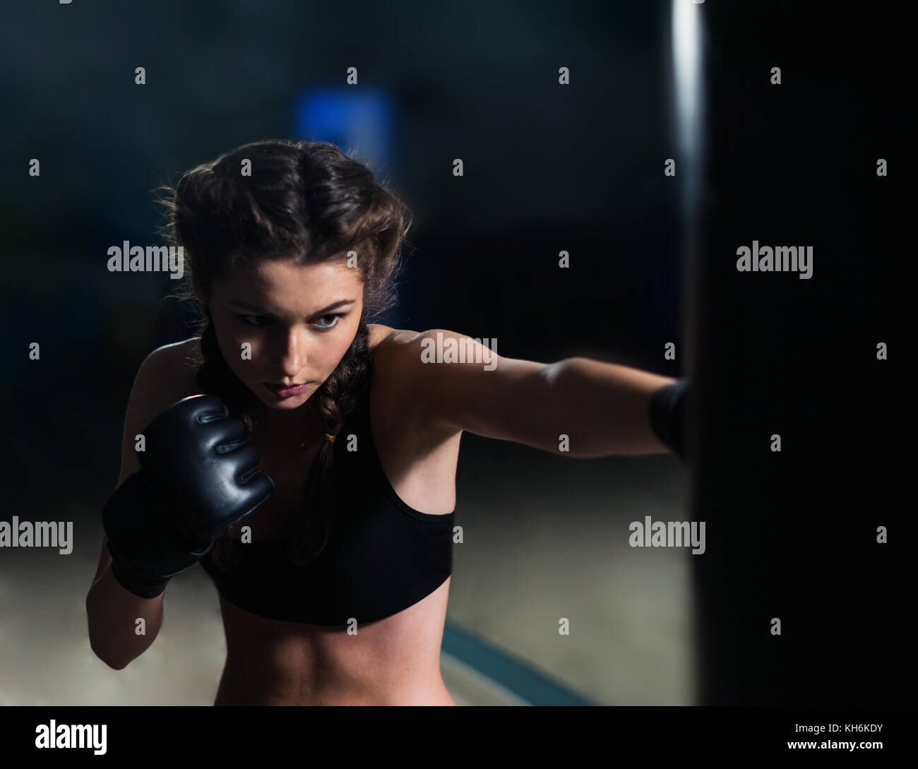 Beautiful young fighter boxer fit girl wearing boxing gloves in Stock ...