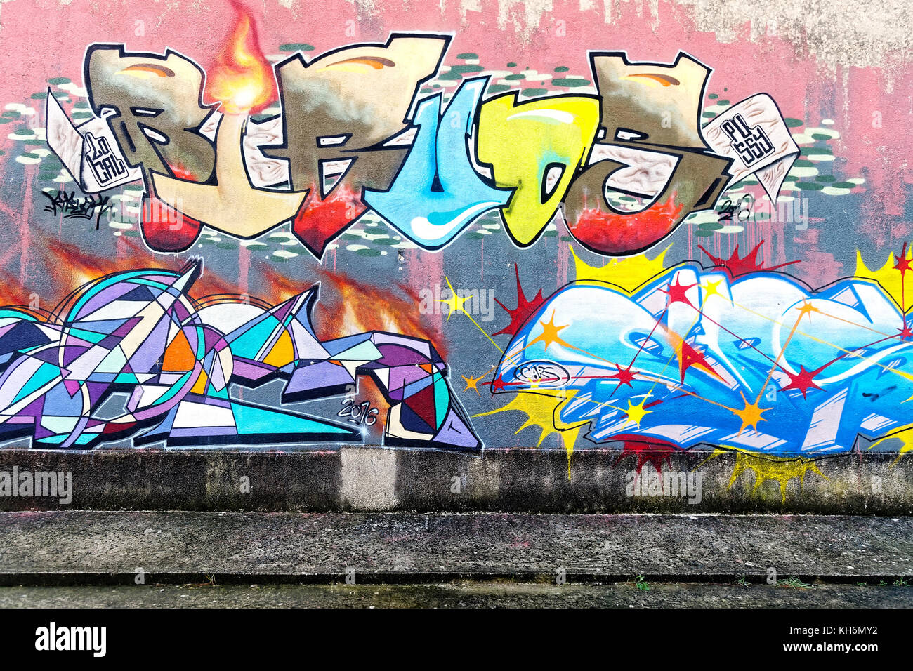 the wall decorated with colourful abstract graffiti Stock Photo - Alamy