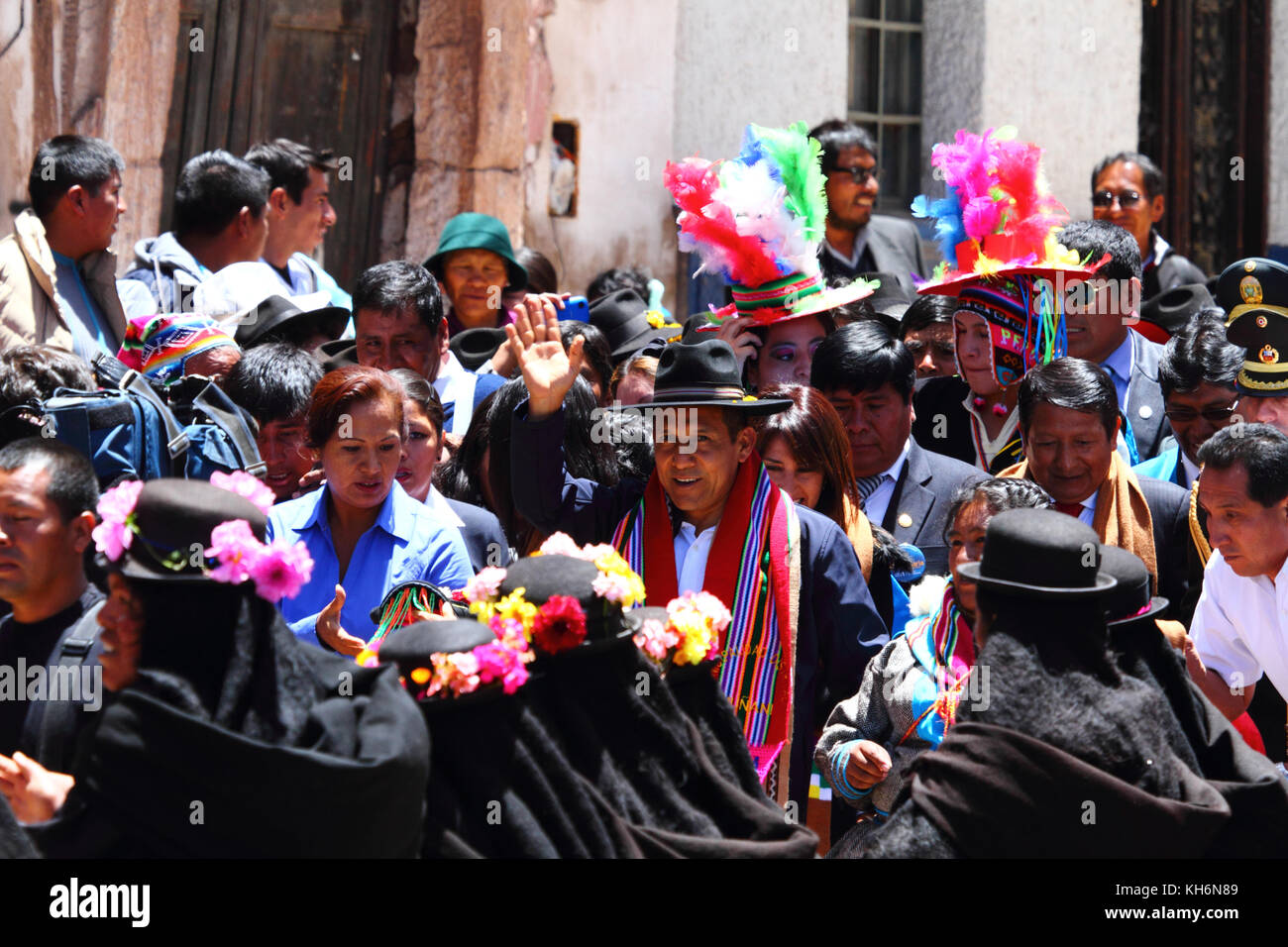 Peruvian president Ollanta Humala (centre) greets crowds as her arrives ...