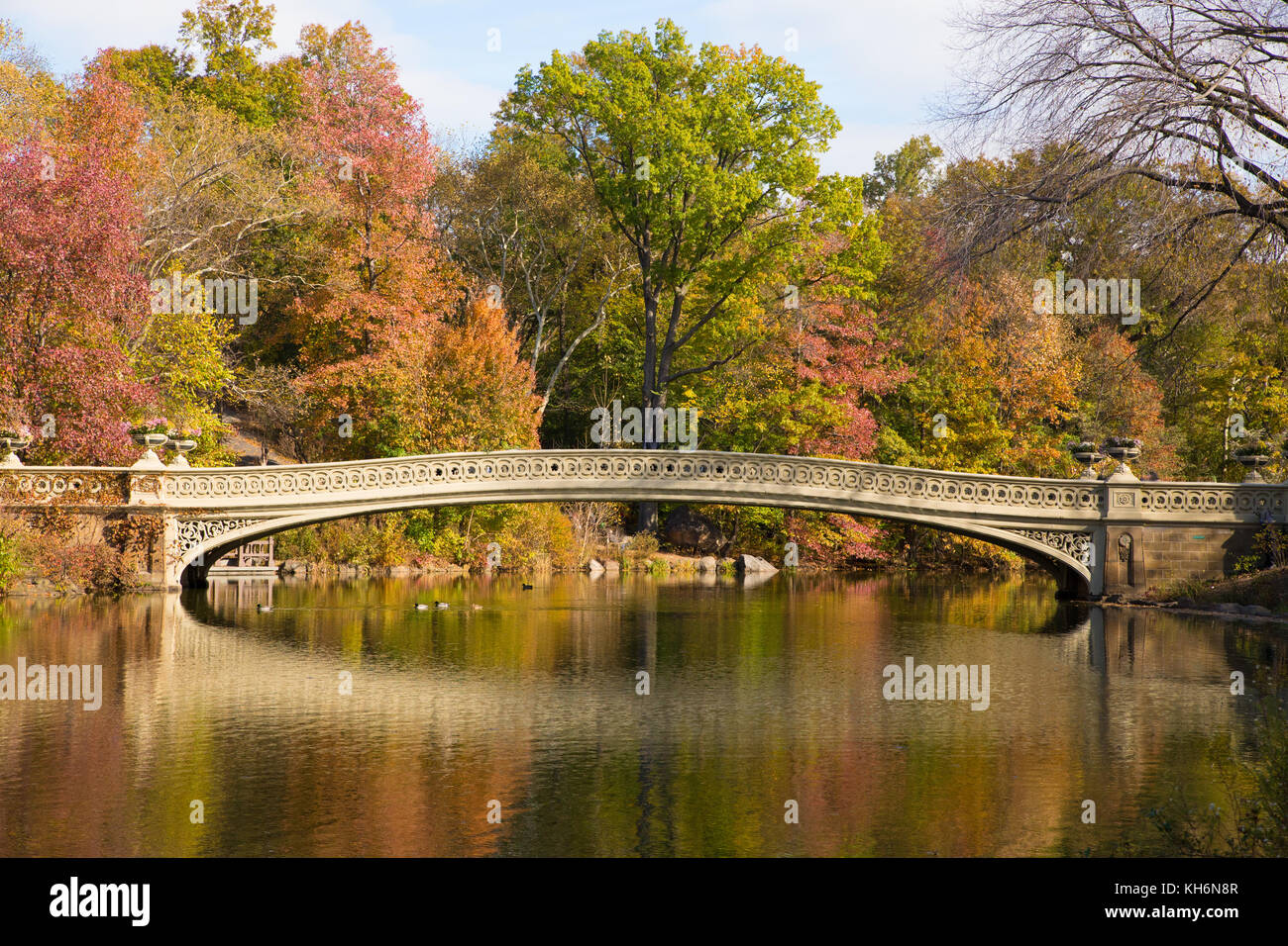 Scenic Bow Bridge in Central Park New York City with colorful autumn ...