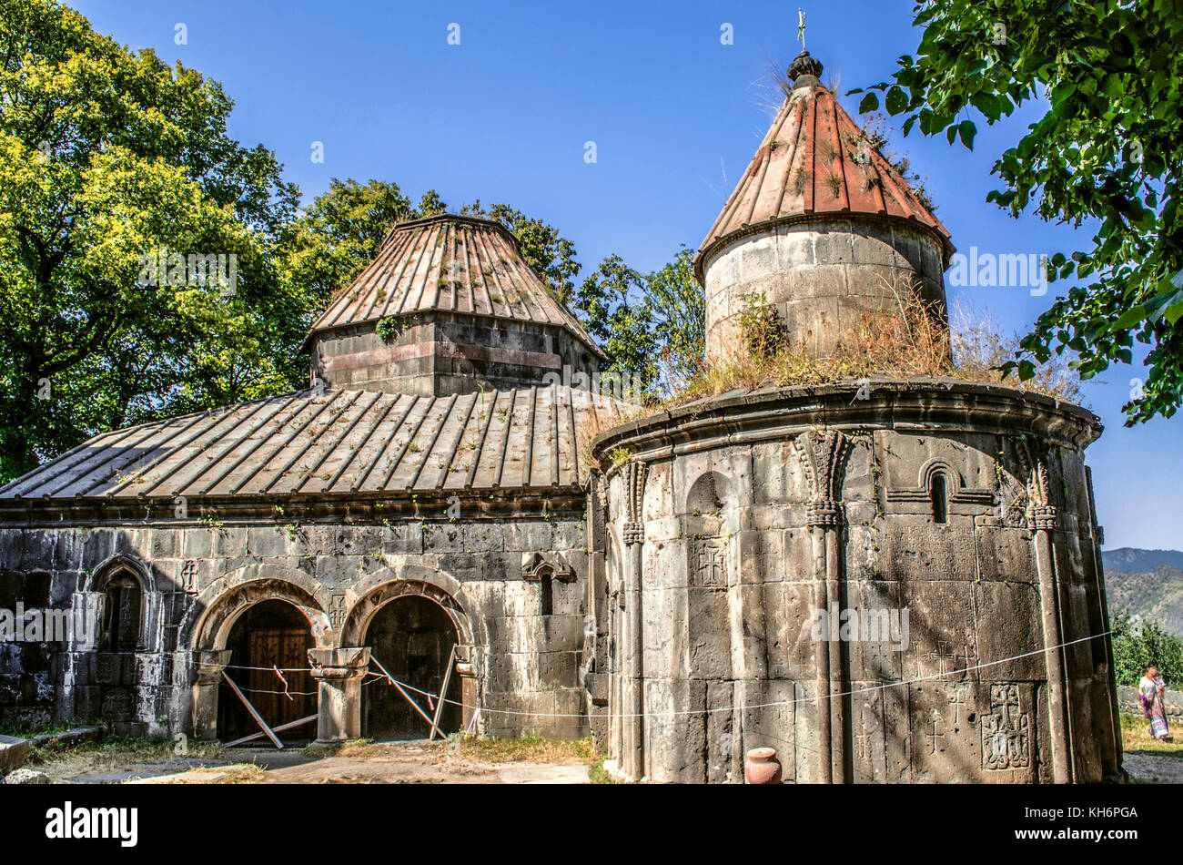 Courtyard of the monastic complex with an arched entrance to the book ...