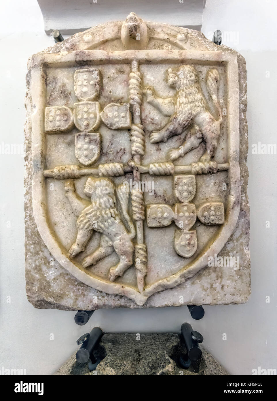Evora Museum in Evora, Portugal. Marble Coat of Arms of Sousas do Prado ...