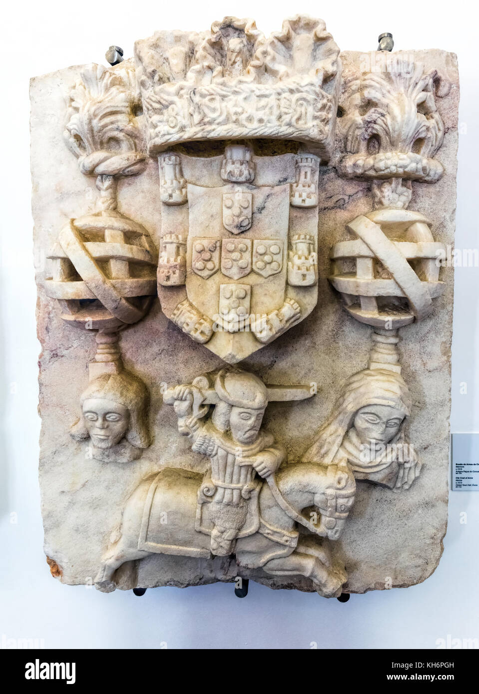 Evora Museum in Evora, Portugal. Marble Coat of Arms of City of Evora ...