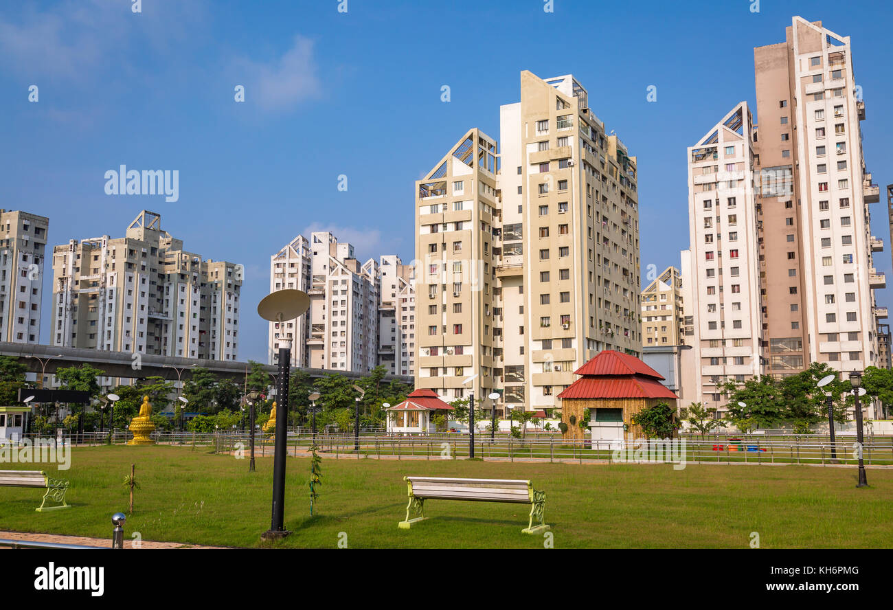 Tall residential buildings with view of an over bridge and well ...